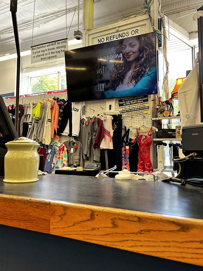 The checkout counter&mdash;final gateway between thrift store dreams and your closet's new reality. No fancy frills, just honest bargains.