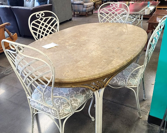 This vintage dining set with lattice-back chairs isn't just furniture&mdash;it's a conversation starter waiting to host your next dinner party debates.