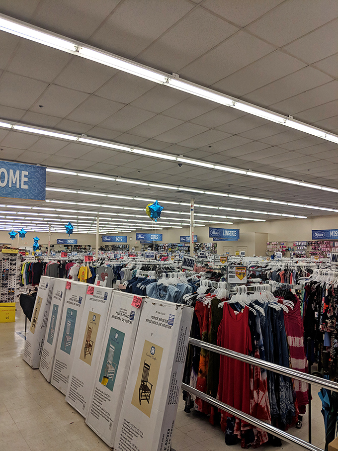 The clothing department is where fashion meets affordability. Those blue star balloons aren't celebrating a sale—they're marking the way back to the exit!