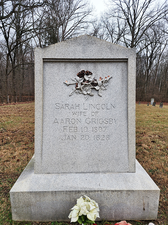 Sarah Lincoln Grigsby's grave marker stands as a poignant reminder of frontier hardship, where history whispers through the trees to anyone willing to listen.