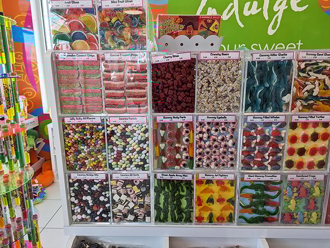 A wall of gummy temptations arranged with military precision &ndash; each cubby a different path to childhood bliss.