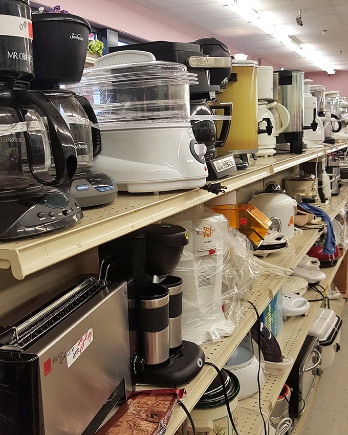 Coffee makers and kitchen gadgets stand at attention, a battalion of appliances ready for their second act.