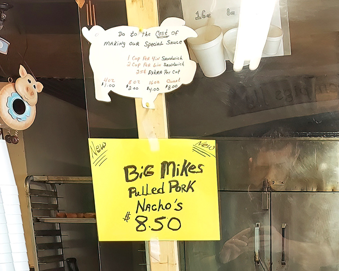 Hand-written menu signs advertising pulled pork nachos&mdash;the barbecue equivalent of finding an unexpected twenty in your winter coat pocket.