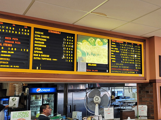 The illuminated menu board&mdash;a beacon of hope for the hungry&mdash;showcases a symphony of options that have kept locals coming back for decades.