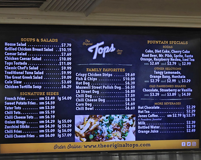 The menu board&mdash;a roadmap to happiness. Classic diner fare without pretension, offering everything from chili cheese fries to chicken strips with zero culinary buzzwords.