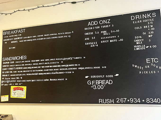 This menu board isn't just a list&mdash;it's a roadmap to happiness. Each sandwich name promises a story, each description a culinary adventure waiting to happen.