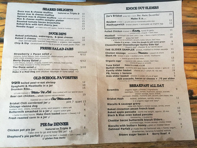 This menu reads like a love letter to comfort food classics. Mason jar mac and cheese? Knock-out sliders? Breakfast all day? Yes, please!