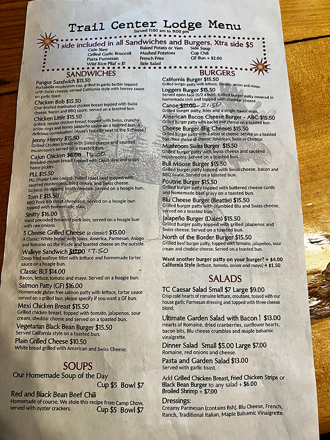 A menu that reads like a love letter to comfort food. The "We stole this recipe from Camp Chow" note on the chili speaks volumes about northwoods humor.