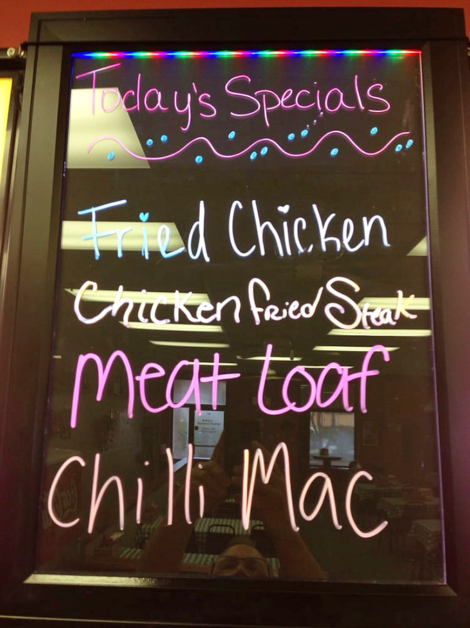 The illuminated specials board glows like a beacon of hope for the hungry. Meatloaf, fried chicken, and chili mac&mdash;the holy trinity of comfort.
