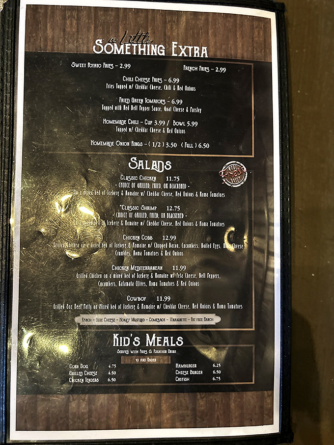 The menu board reads like a love letter to Southern comfort food. No molecular gastronomy here, just dishes that make you want to hug the chef.