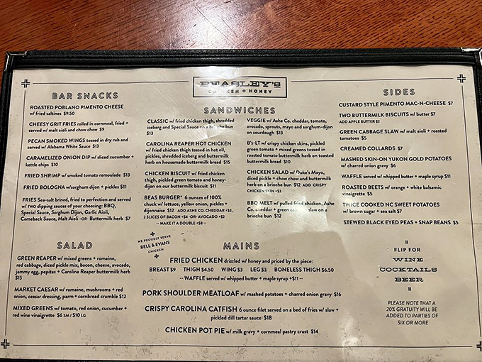 A menu that reads like poetry to comfort food lovers. Each description promises Southern classics elevated just enough to intrigue without intimidating