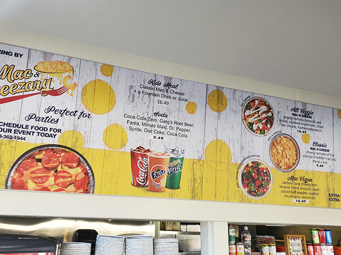 The menu board's yellow splashes against whitewashed wood is like a roadmap to happiness. Choose your cheesy adventure wisely.