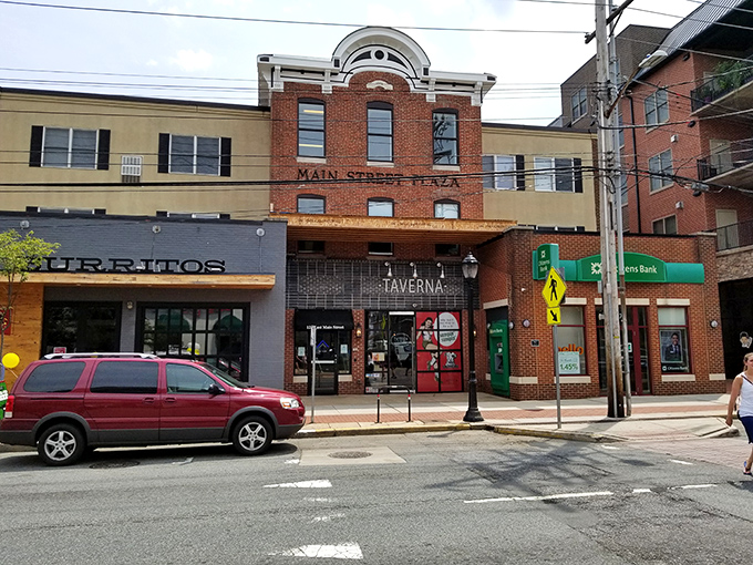 Taverna anchors Main Street with Mediterranean flair, tempting passersby with aromas of wood-fired cuisine in a brick-front sanctuary.