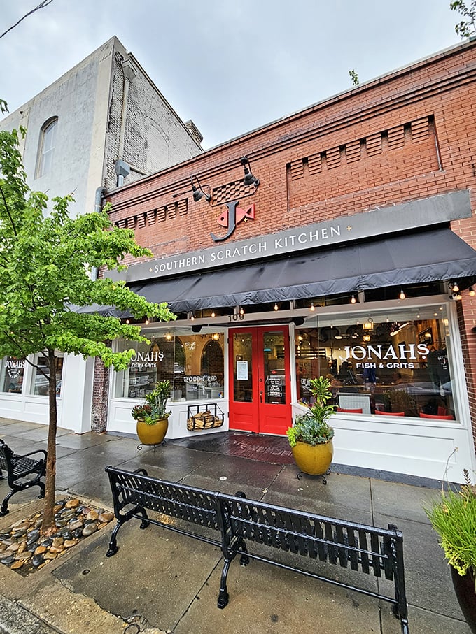 Jonah's Fish & Grits welcomes hungry visitors with its signature red door, promising Southern flavors that would make your grandmother both proud and jealous.