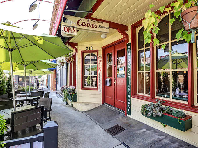 Cirino's vibrant red facade and lime-green umbrellas aren't just inviting &ndash; they're practically shouting "Get in here and eat something delicious already!"