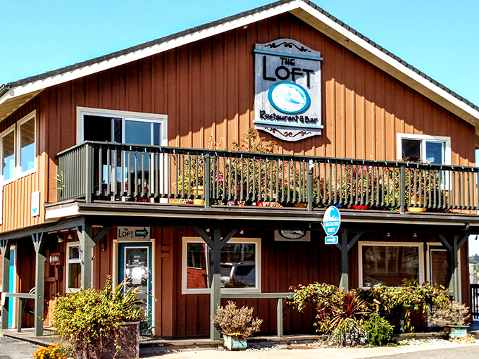 The Loft Restaurant's rustic wooden exterior promises the kind of seafood experience that makes you consider a career change to commercial fishing.