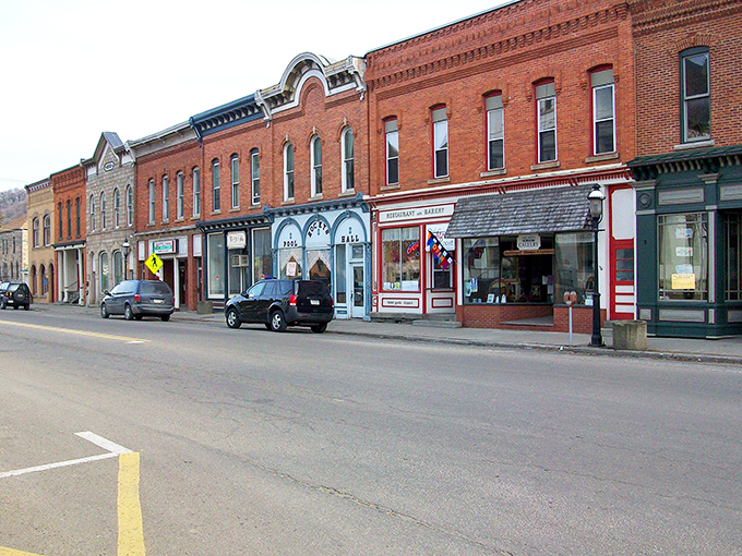 These well-preserved 19th-century storefronts aren't just buildings—they're time capsules housing modern businesses with old-fashioned service that big-box retailers can only dream about.