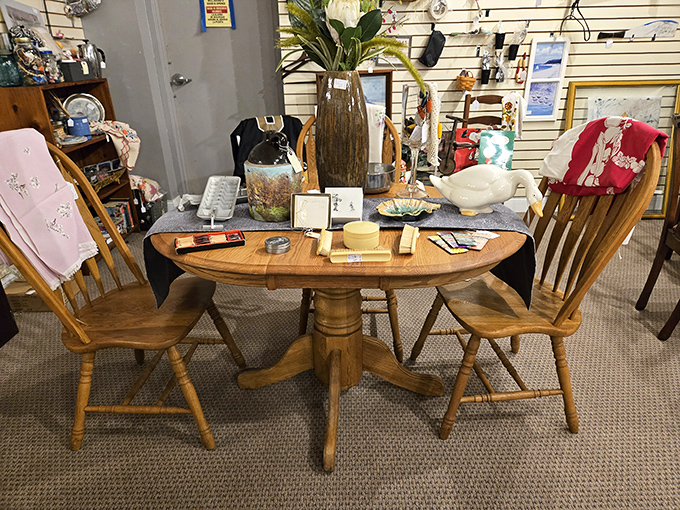 Mid-century oak meets modern staging in this vignette. That table has hosted more family dinners than a Thanksgiving marathon on the Hallmark Channel.