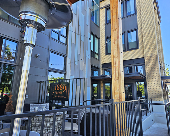 1889 Prime's modern exterior gleams in the sunlight, a sleek sentinel guarding Olympia's finest steaks within.
