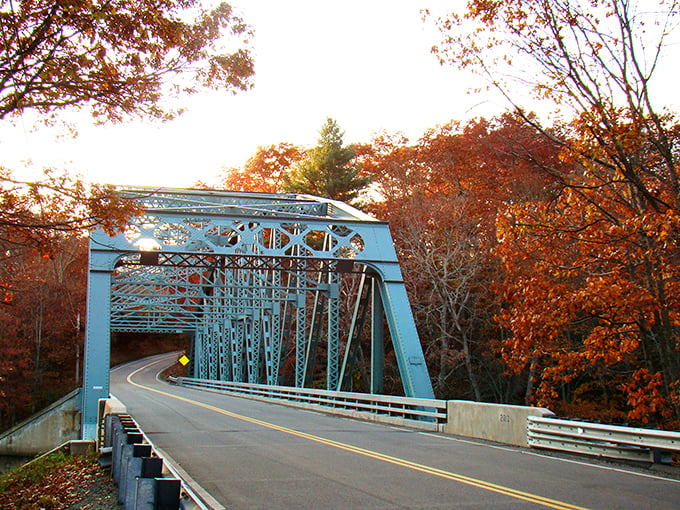 Canterbury's steel bridge frames autumn foliage in a scene so beautiful, you'd never guess it's one of Connecticut's most affordable towns.