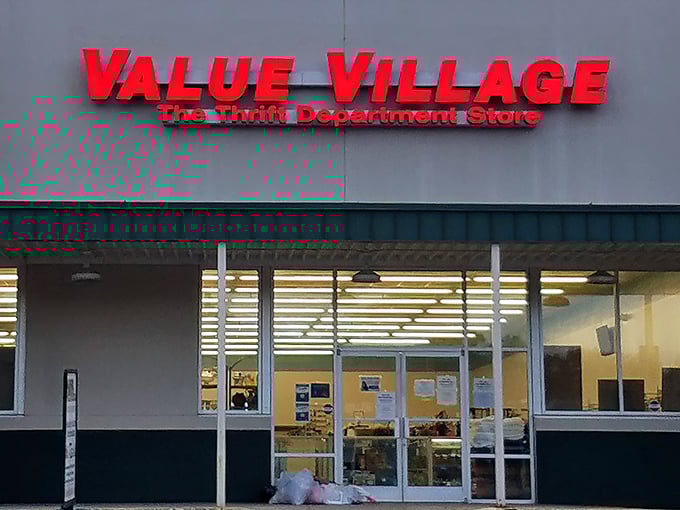 Value Village's bold red sign cuts through retail noise with a simple promise: more stuff, less money. Thrift nirvana awaits!