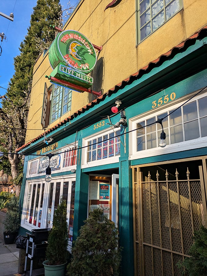 The Mississippi Pizza's vintage yellow building stands out like a delicious time capsule in Portland's ever-changing landscape.
