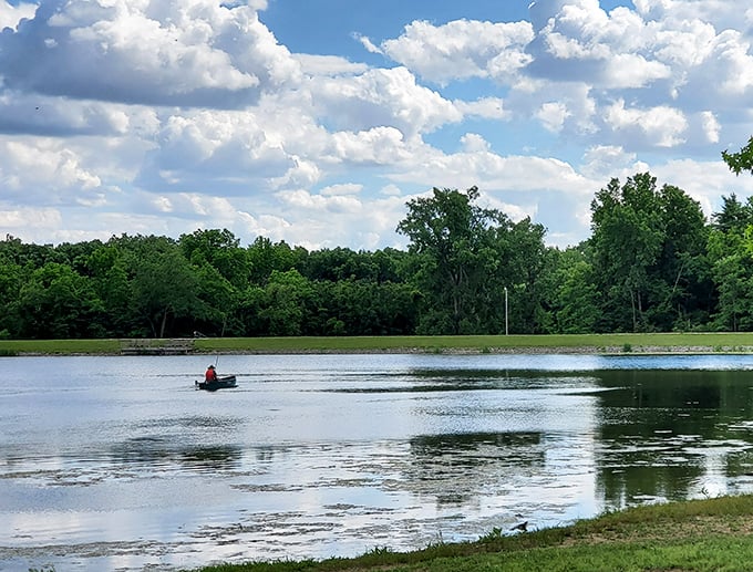 A lone paddler creates gentle ripples across Ouabache State Park's tranquil waters. Social distancing at its most beautiful.