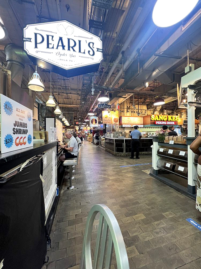 Pearl's bustling counter in Reading Terminal Market&mdash;where oyster shucking becomes performance art and lunch becomes an event.