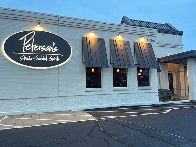 Peterson's crisp white exterior with classic black awnings hints at what's inside: no-nonsense perfection on a plate.