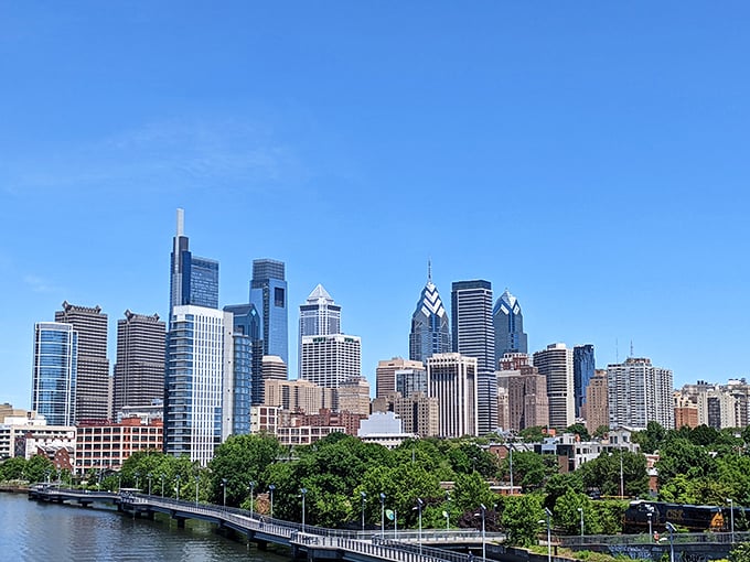 Philadelphia's modern skyline stretches toward the clouds, a glittering testament to the city that shaped America. Rocky would approve of this view!