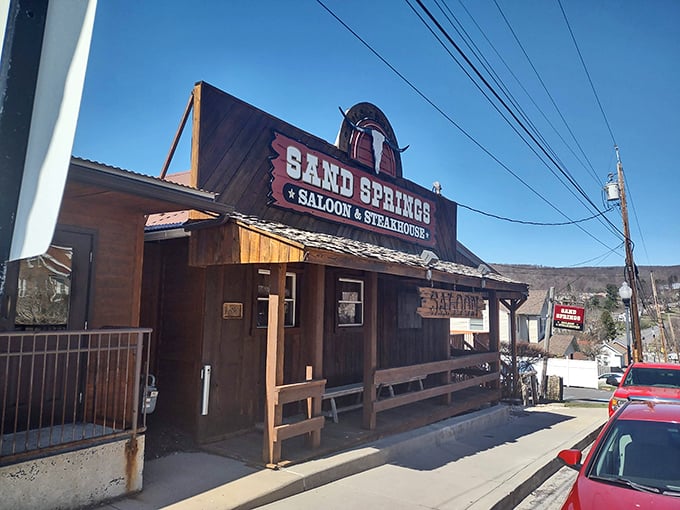 Saddle up for steak nirvana at Sand Springs! This western-style facade promises a deliciously wild ride for your taste buds.