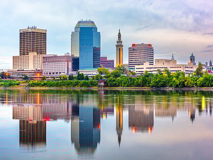The city skyline reflects in the Connecticut River, proving beauty doesn't have to break the bank in Massachusetts' third-largest city.