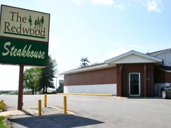 The Redwood Steakhouse sits unassumingly, proving great food doesn't need flashy advertising to shine.