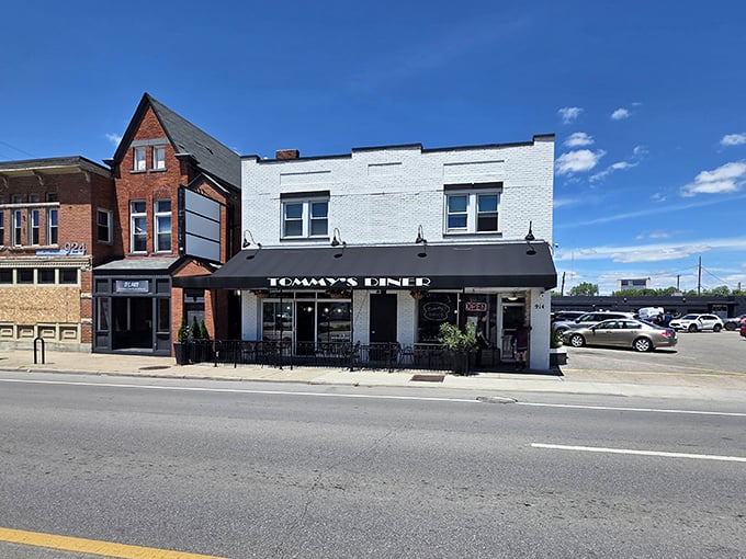 Tommy's Diner brings the 1950s back to life with a storefront that promises comfort food and conversations that flow like coffee.