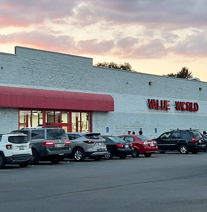 Value World in Warren glows like a bargain beacon at sunset. The packed parking lot tells you everything you need to know about what's inside.