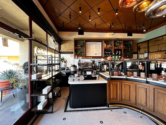 Warm wood meets industrial chic in this temple of fried dough. The open layout invites you to witness donut artistry in action.