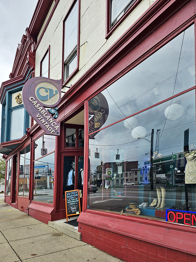 Time travel never looked so stylish! The distinctive red trim and bay windows showcase mannequins dressed in yesterday's finest.