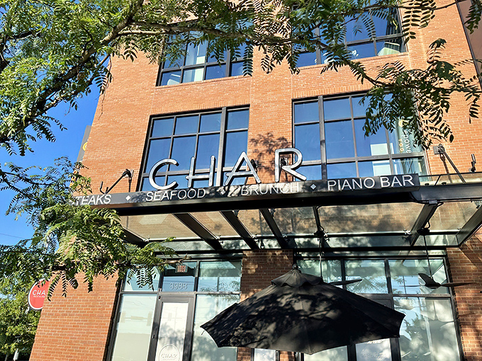 Char Restaurant (Nashville): Sunlight streams through those windows by day, but the real magic happens when steaks hit the grill.