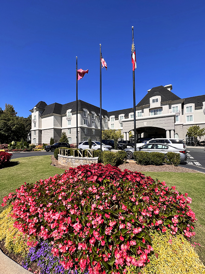 Where Southern hospitality meets ch&acirc;teau luxury. Those flags seem to say, "Y'all are royalty today!"