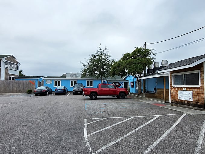 The blue buildings of Chick's Oyster Bar stand ready for your seafood pilgrimage &ndash; where Virginia Beach locals go when tourists aren't looking.