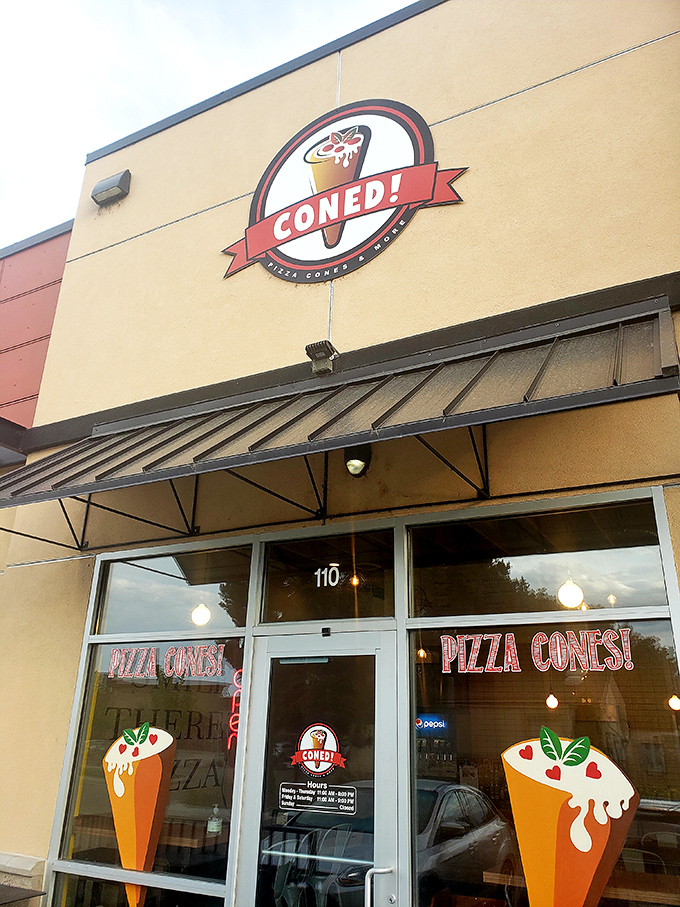 Those painted pizza cones on the window are like a sneak preview of the handheld deliciousness waiting inside. Portable genius!