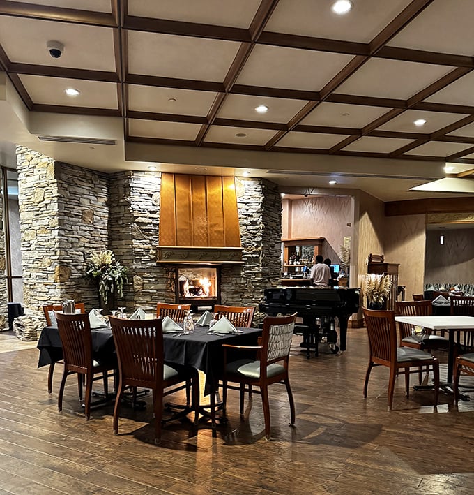 Elegant without pretension, that stone fireplace isn't the only thing bringing the heat to this dining room.