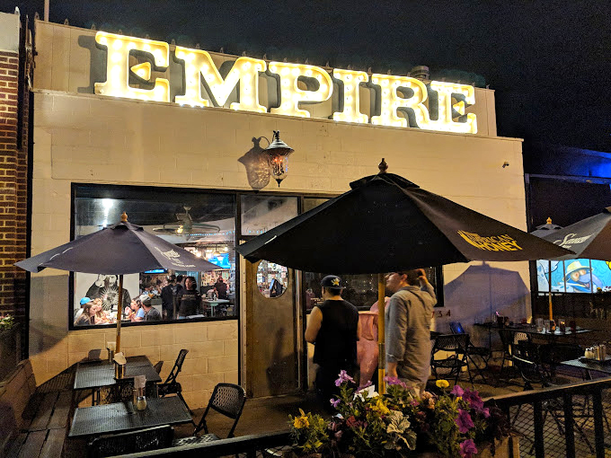 Empire's patio invites you to linger over one more slice. The night air somehow makes their pizza taste even better.
