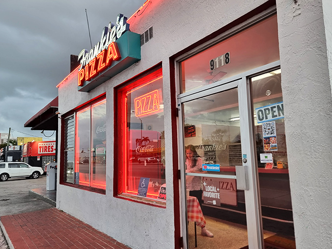 The neon glow of Frankie's Pizza has been guiding hungry Miamians to square slice heaven since before South Beach was cool.