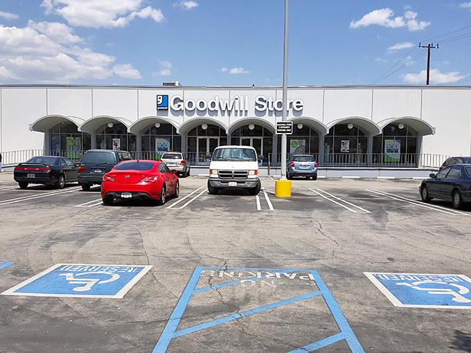 The arched entryway of this Goodwill serves as a portal to affordable fashion adventures and unexpected household gems.