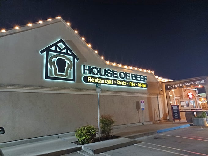 Night falls, but House of Beef's sign shines bright &ndash; promising tri-tip treasures to those wise enough to stop.
