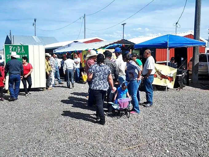 Community gathering at its finest. Where else can you shop, socialize, and haggle all in one gravel-covered afternoon?