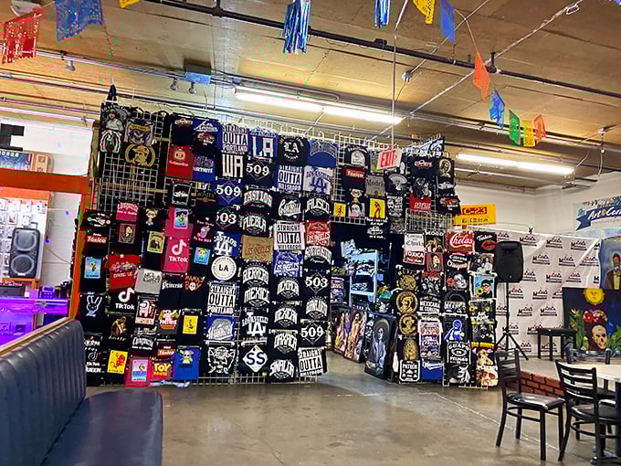 This wall of t-shirts tells stories of places visited, teams supported, and personalities expressed. Wearable memories waiting for new owners.