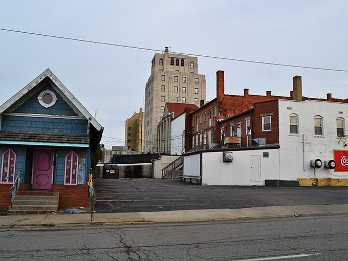 Behind Mansfield's charming downtown lies an eclectic mix of architectural styles, where a blue cottage sits unexpectedly among the brick buildings.