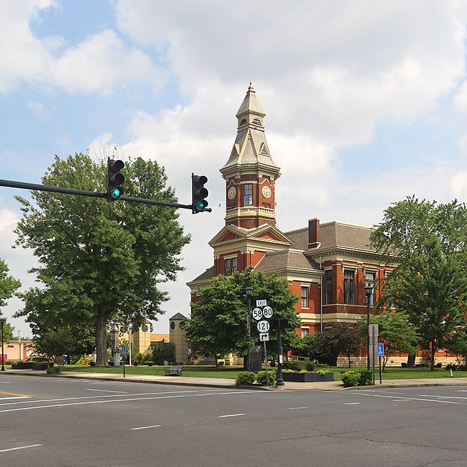 The historic courthouse with its distinctive clock tower stands at the center of town, a beautiful brick landmark that has served the community for generations.